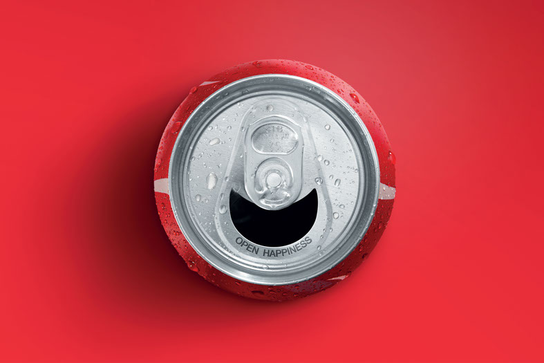 E agora tem também a Happy Can, a lata da Coca-Cola que sorri pra você ...